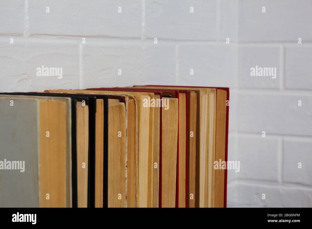 A stack of old books. Bookstore, library, bookshelf. Vintage, retro ...