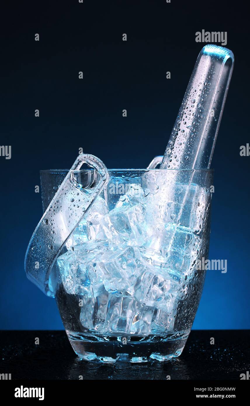 Dark blue bucket of ice background hi-res stock photography and images ...