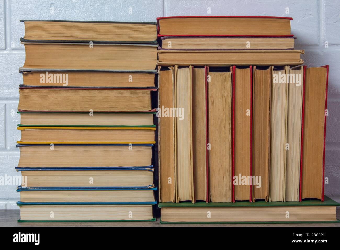 A stack of old books. Bookstore, library, bookshelf. Vintage, retro ...