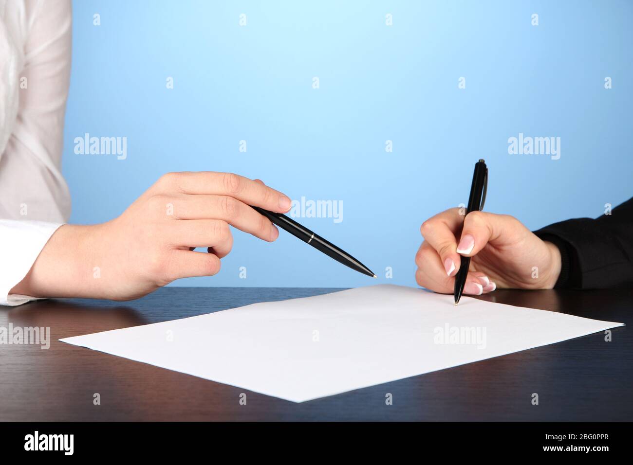Signing document blue hi-res stock photography and images - Alamy