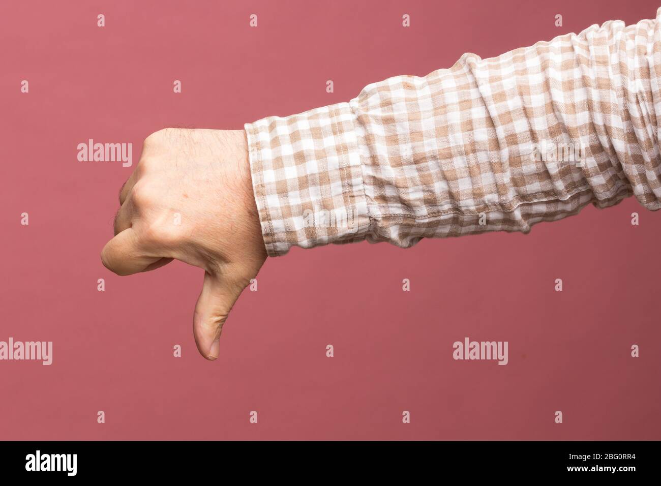 The perfection of an adult hand, with all five fingers, making signs ...