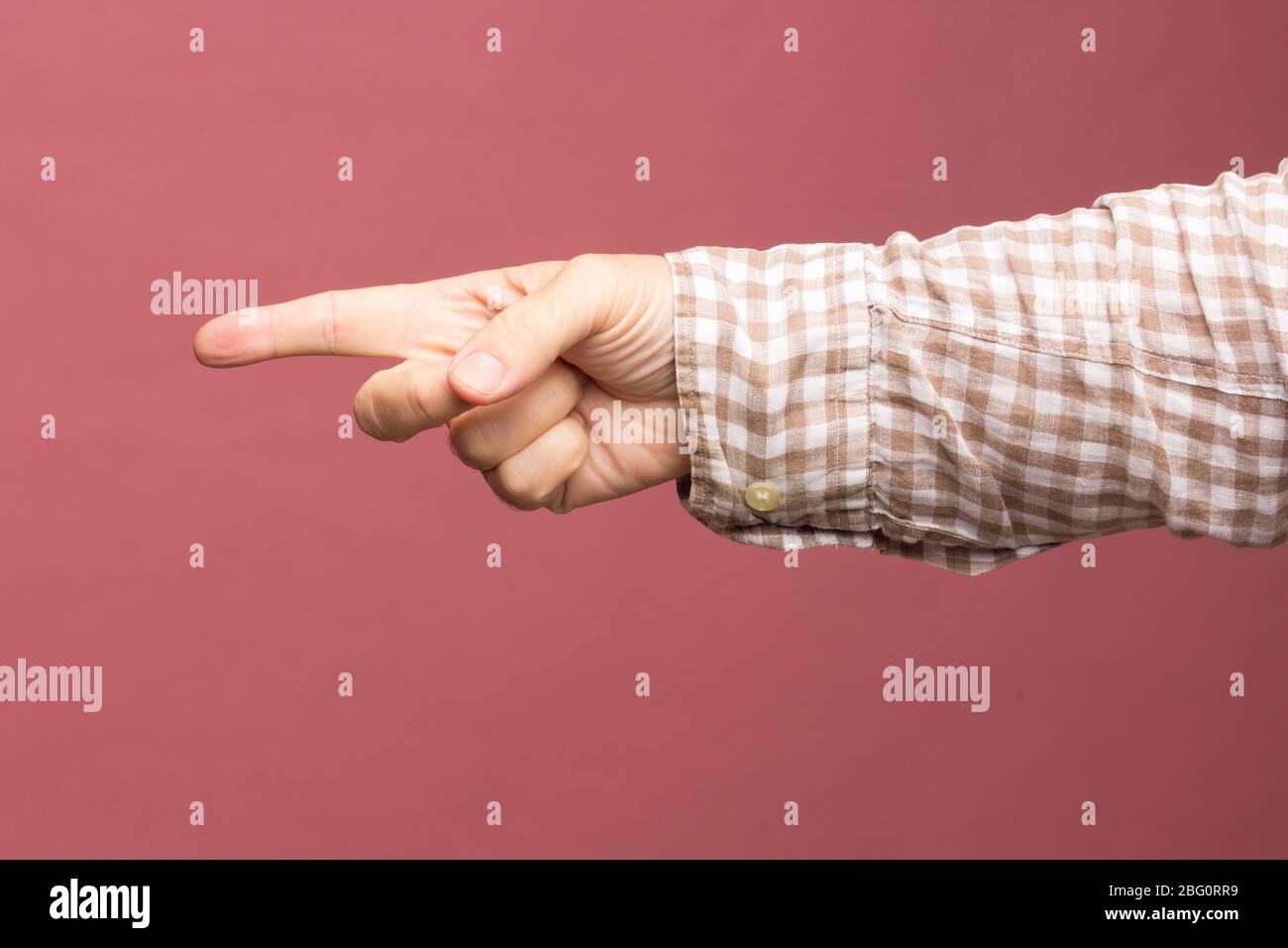 The perfection of an adult hand, with all five fingers, making signs ...