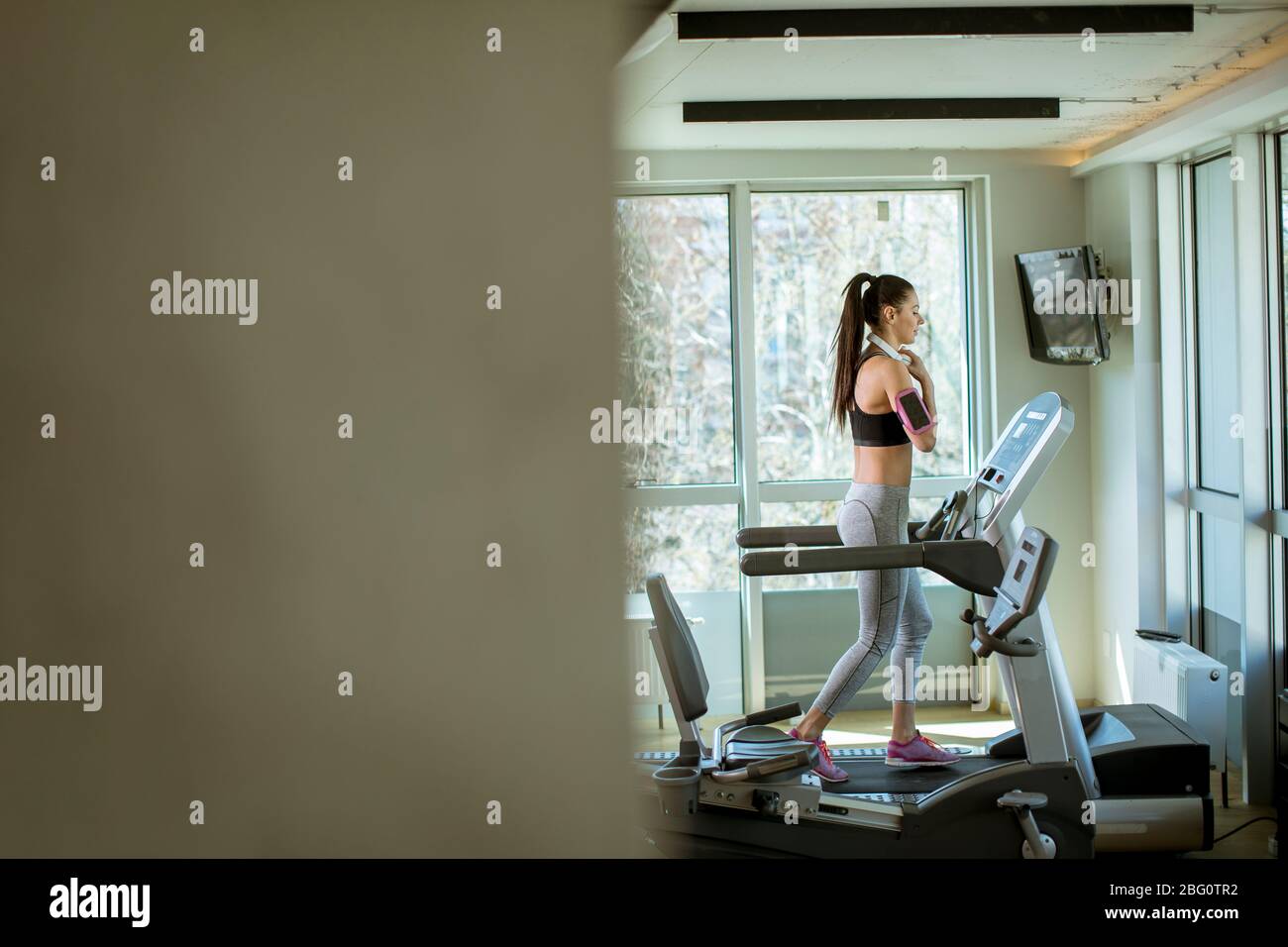 Young attractive female treadmill runner hi-res stock photography and ...