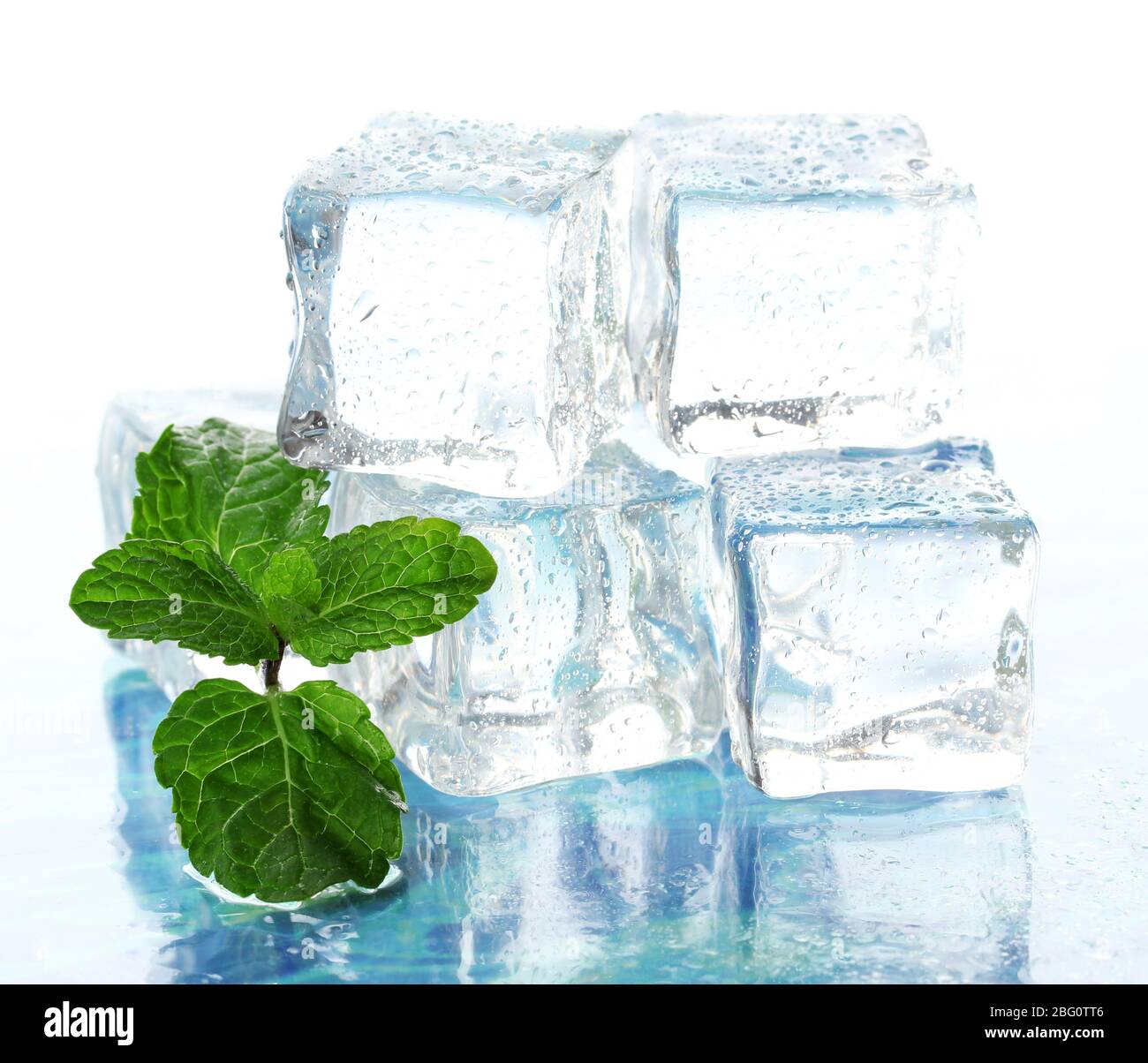 Ice with mint on light background Stock Photo - Alamy