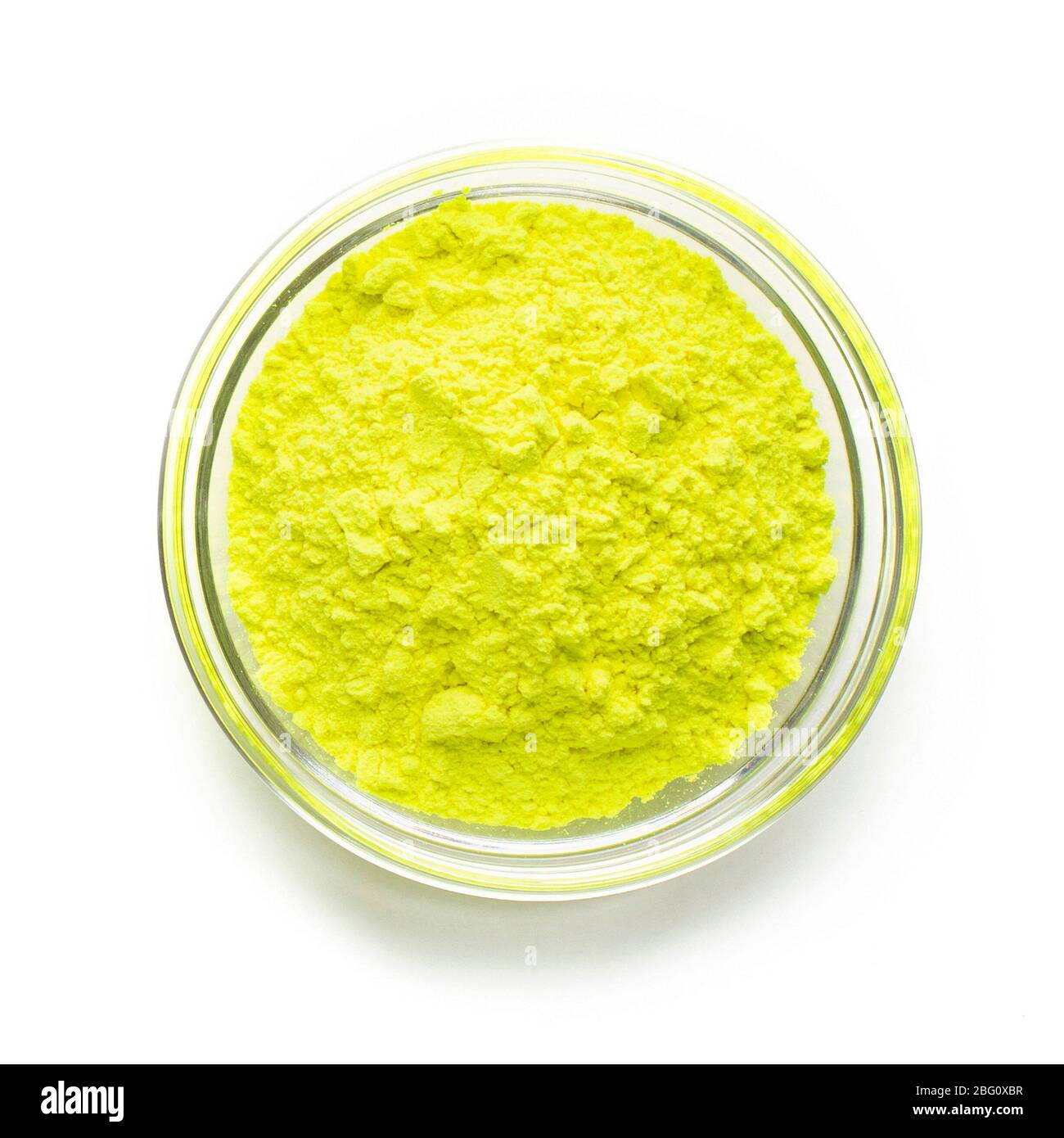Yellow powder paint in glass bowl, top view Stock Photo - Alamy