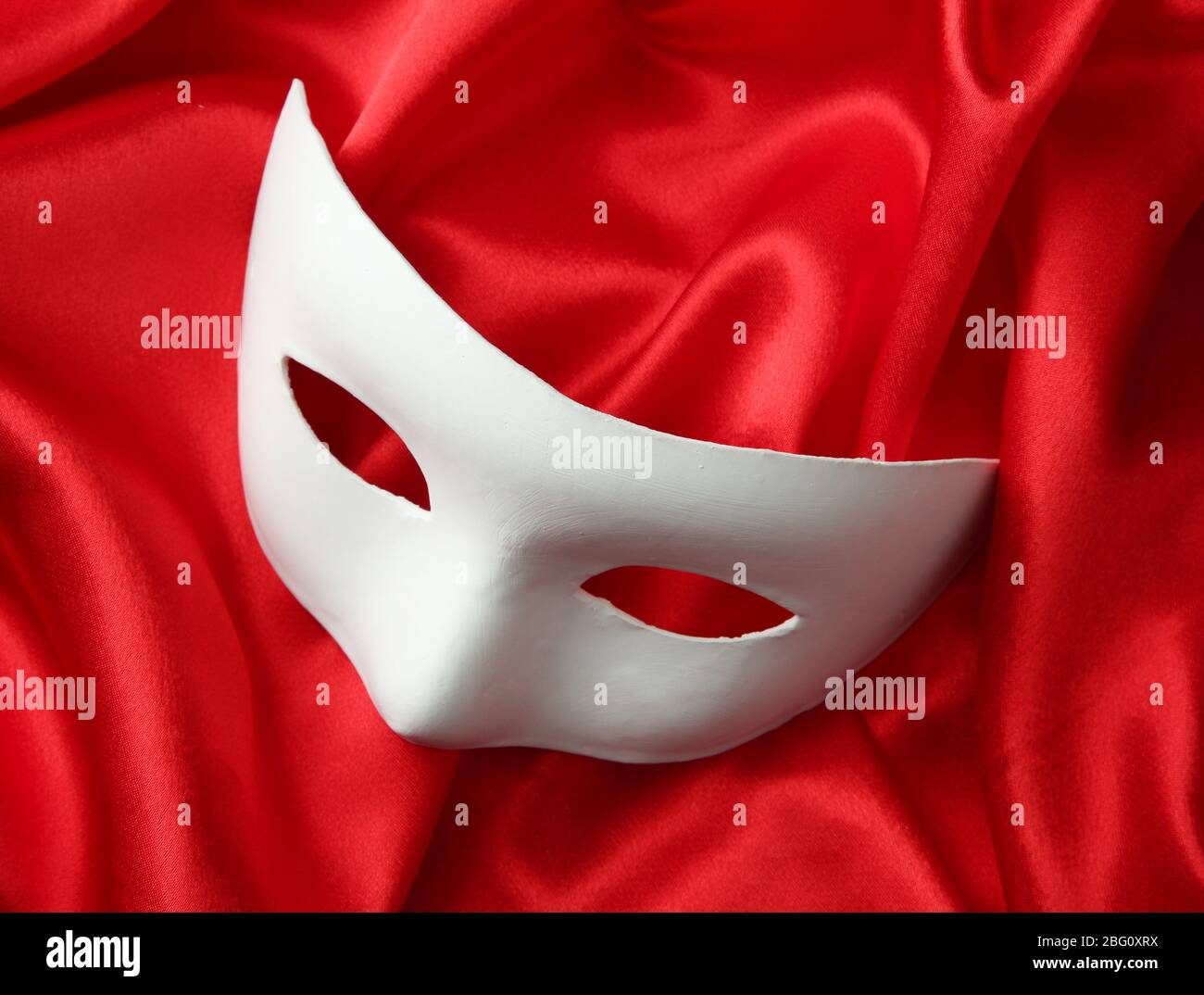 White mask on red hi-res stock photography and images - Alamy
