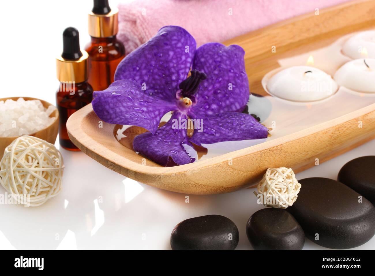 Beautiful spa setting isolated on white Stock Photo - Alamy