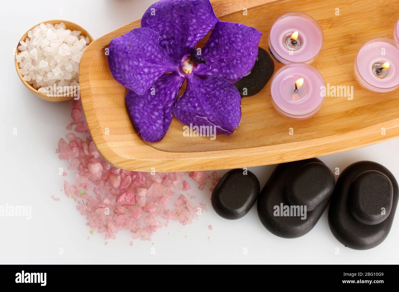 Beautiful spa setting isolated on white Stock Photo - Alamy