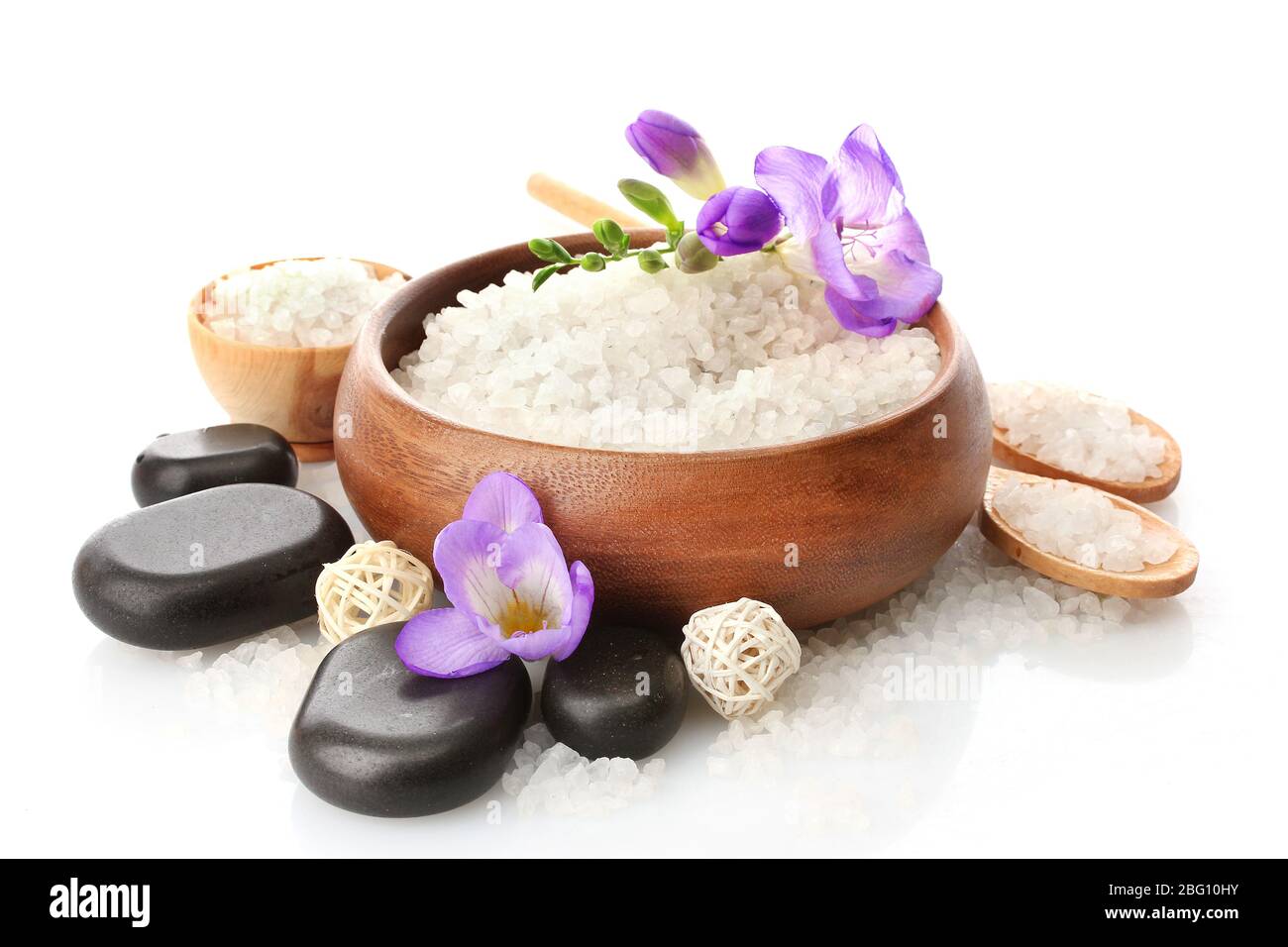 Beautiful spa setting with flowers, isolated on white Stock Photo - Alamy