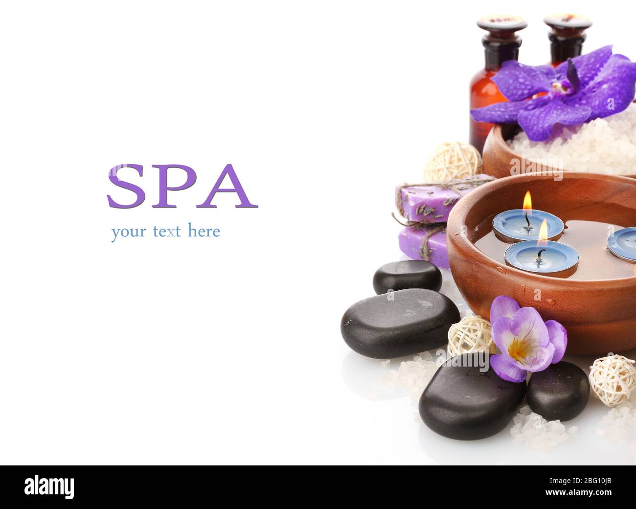 Beautiful spa setting with flowers, isolated on white Stock Photo - Alamy
