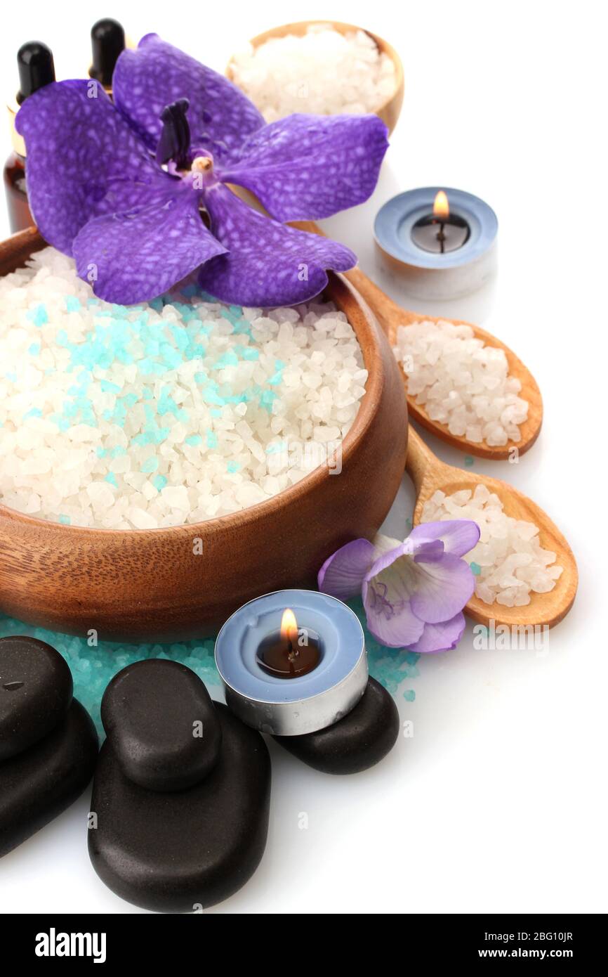 Beautiful spa setting with flowers, isolated on white Stock Photo - Alamy