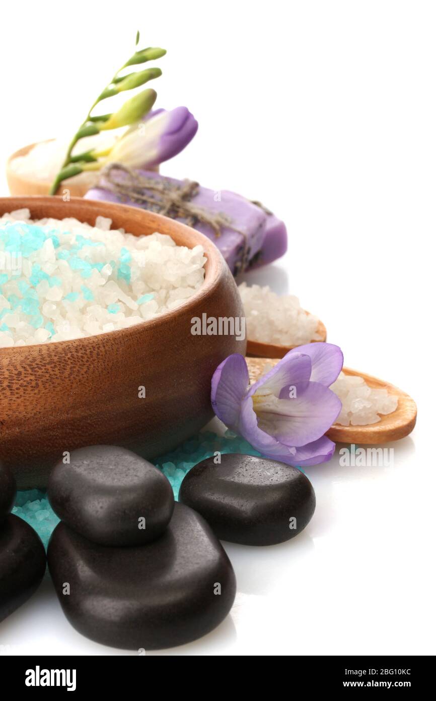 Beautiful spa setting with flower, isolated on white Stock Photo - Alamy