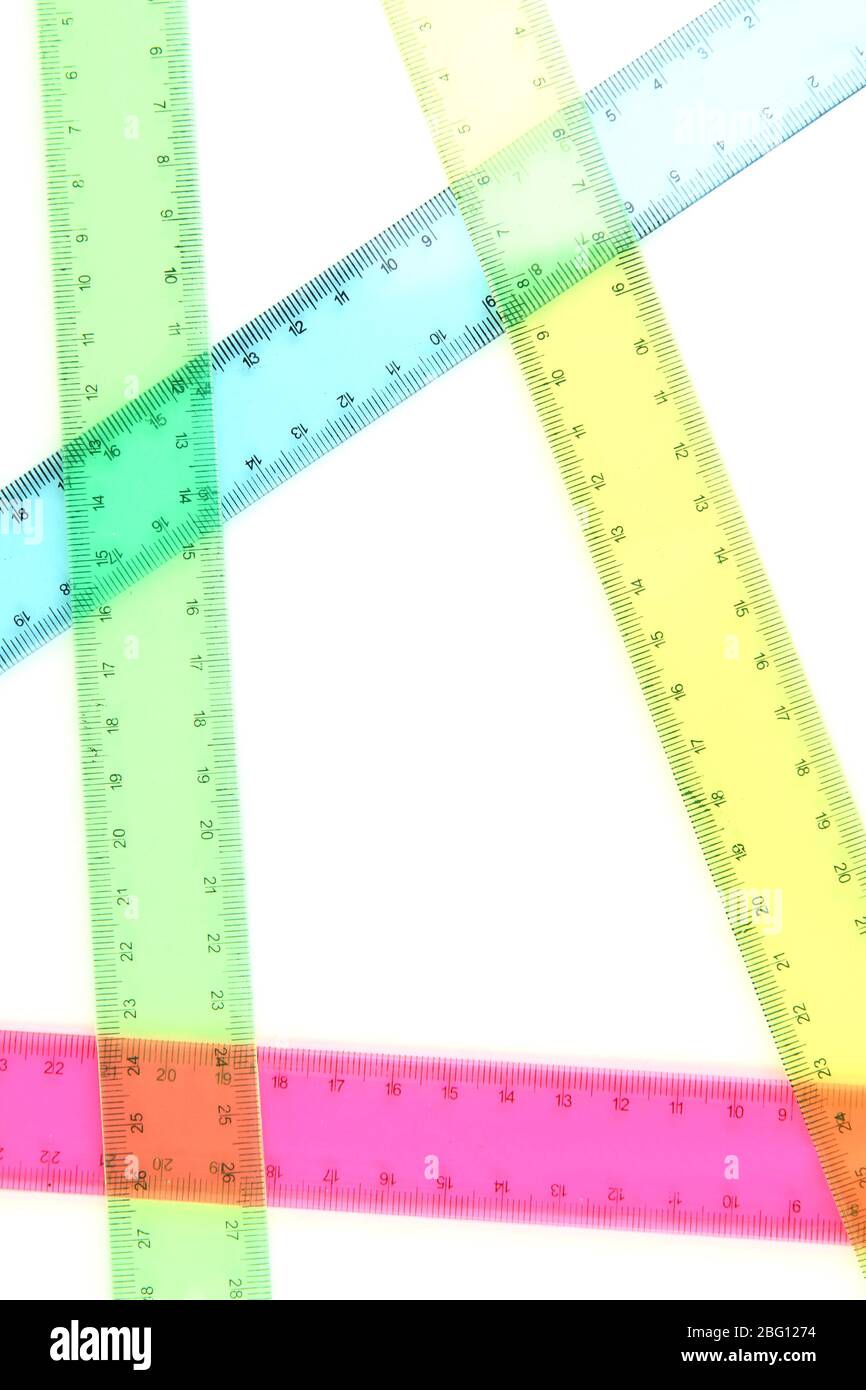 Plastic rulers isolated on white Stock Photo - Alamy