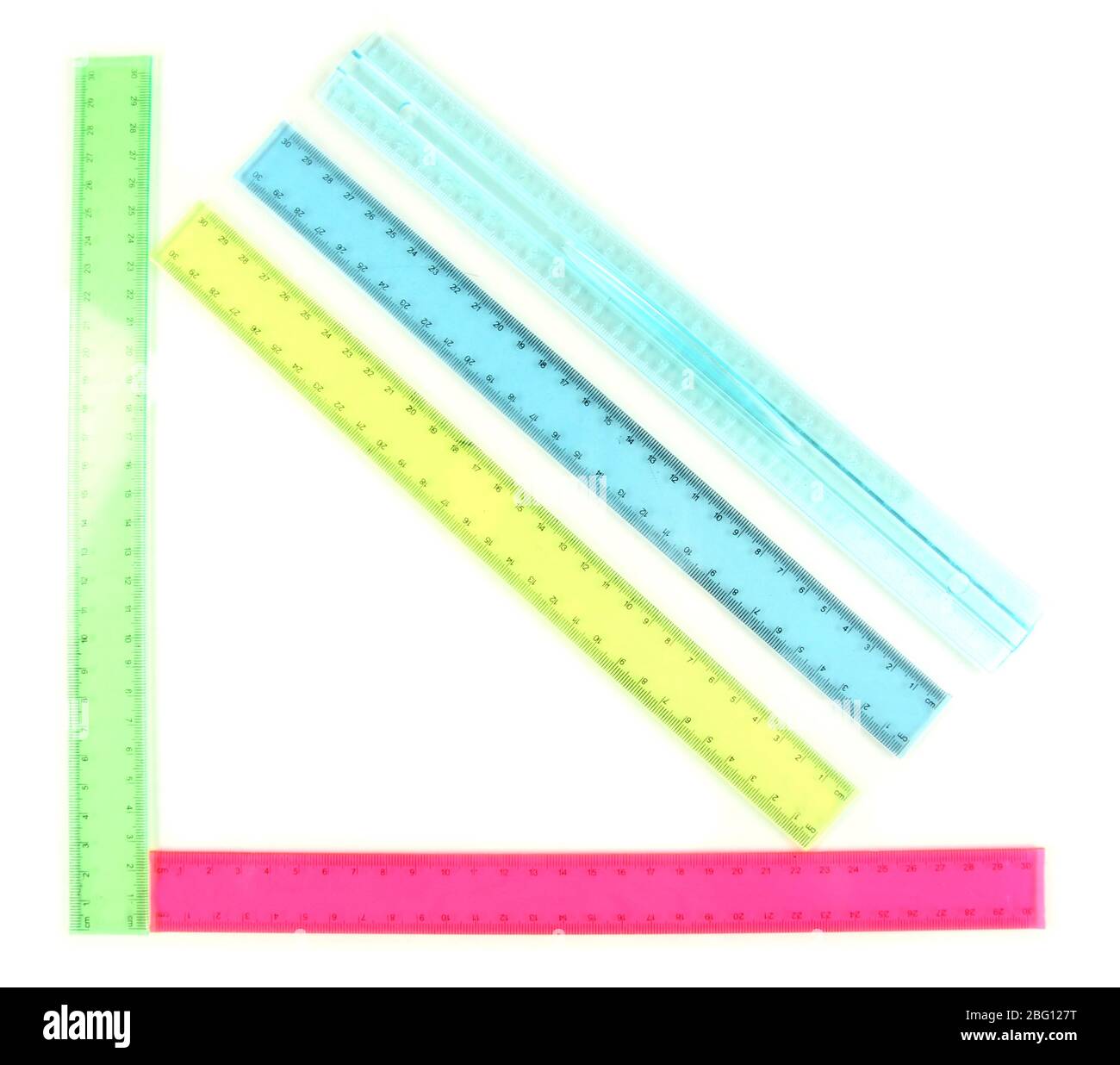 Plastic rulers isolated on white Stock Photo - Alamy