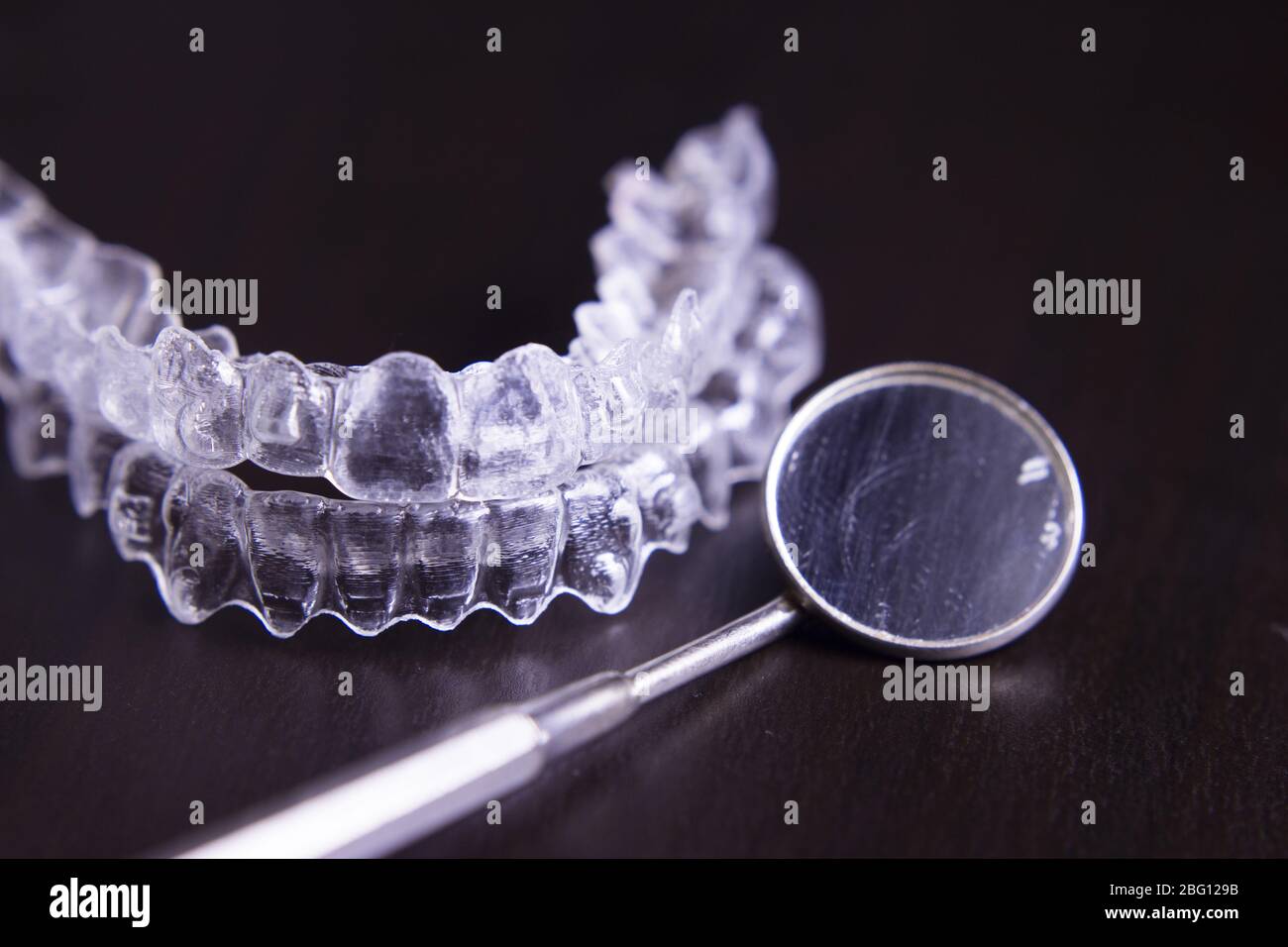 Transparent plastic dental retainer teeth alignment corrector with ...