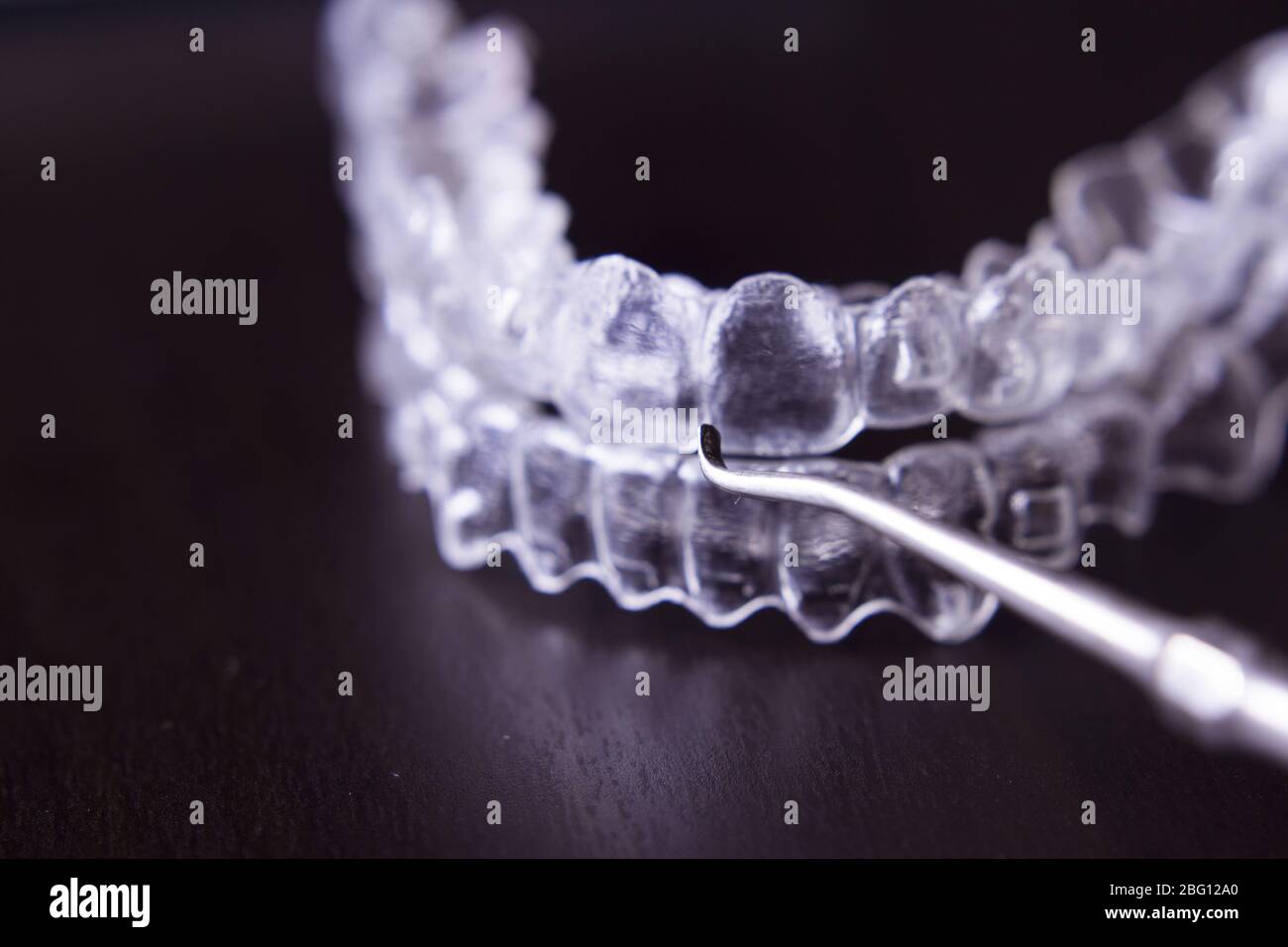 Transparent plastic dental retainer teeth alignment corrector with ...