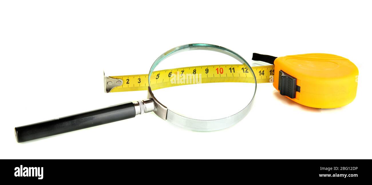 Tape measure with magnifying glass isolated on white Stock Photo - Alamy