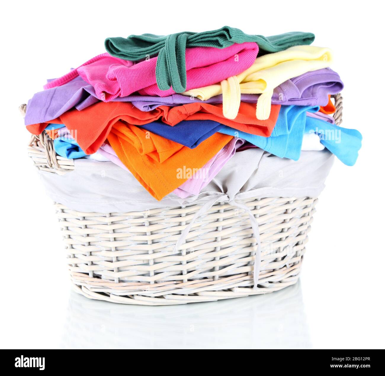 Clothes in wooden basket isolated on white Stock Photo - Alamy