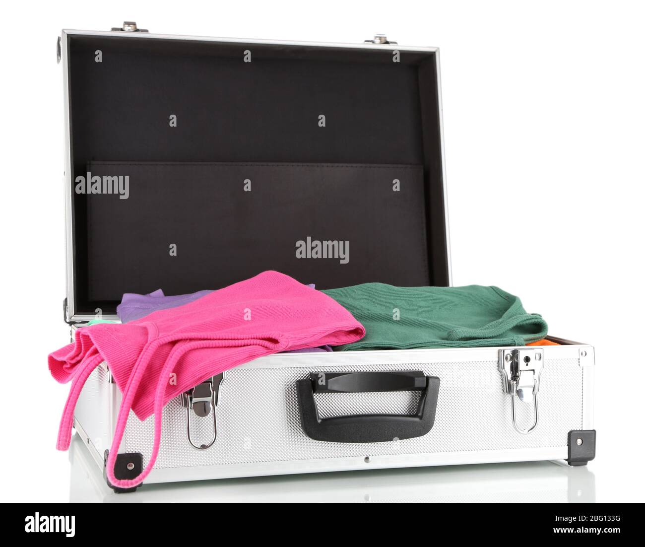 Open silver suitcase with clothing isolated on white Stock Photo - Alamy