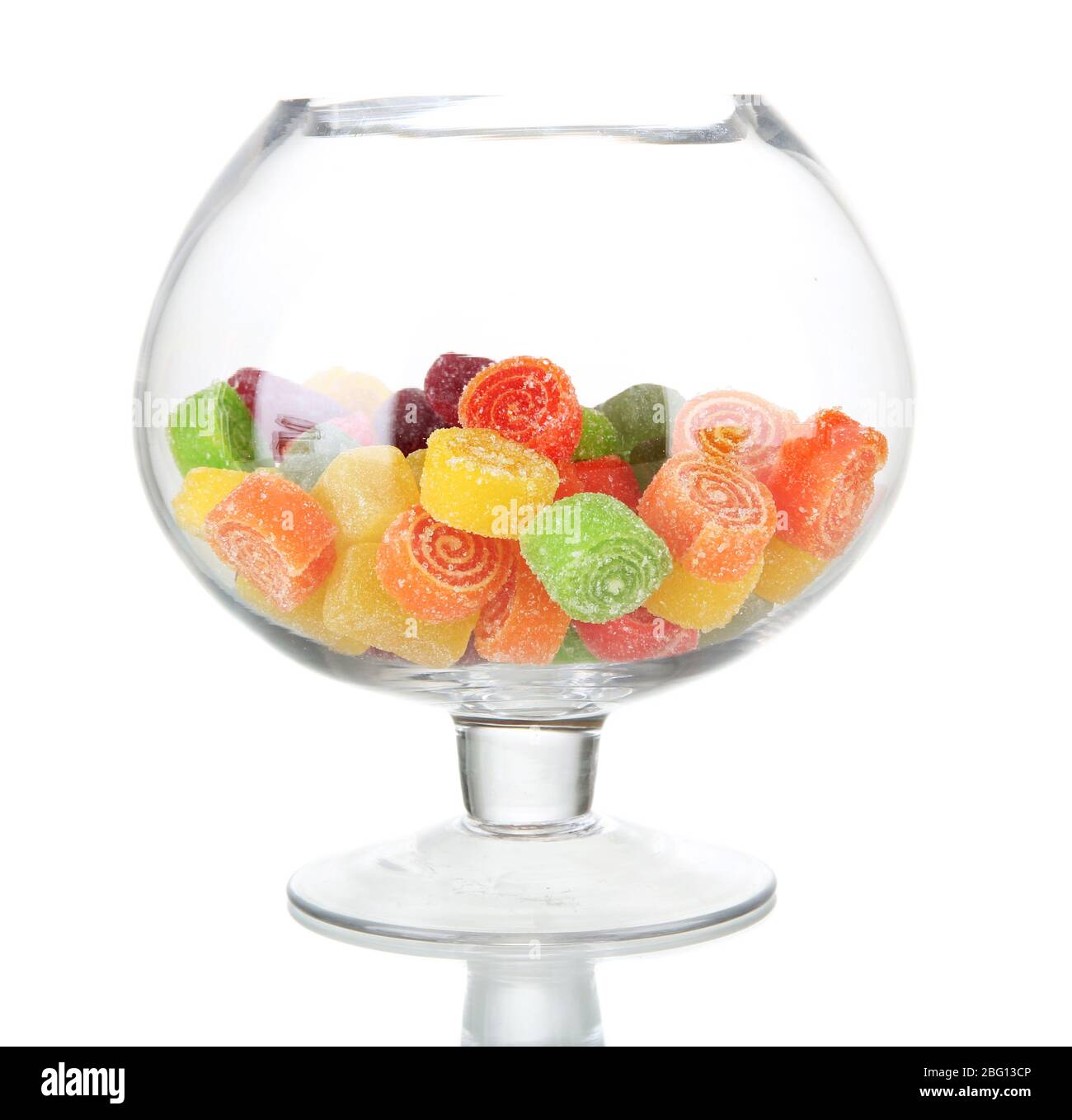 Multicolor candies in glass bowl, isolated on white Stock Photo - Alamy