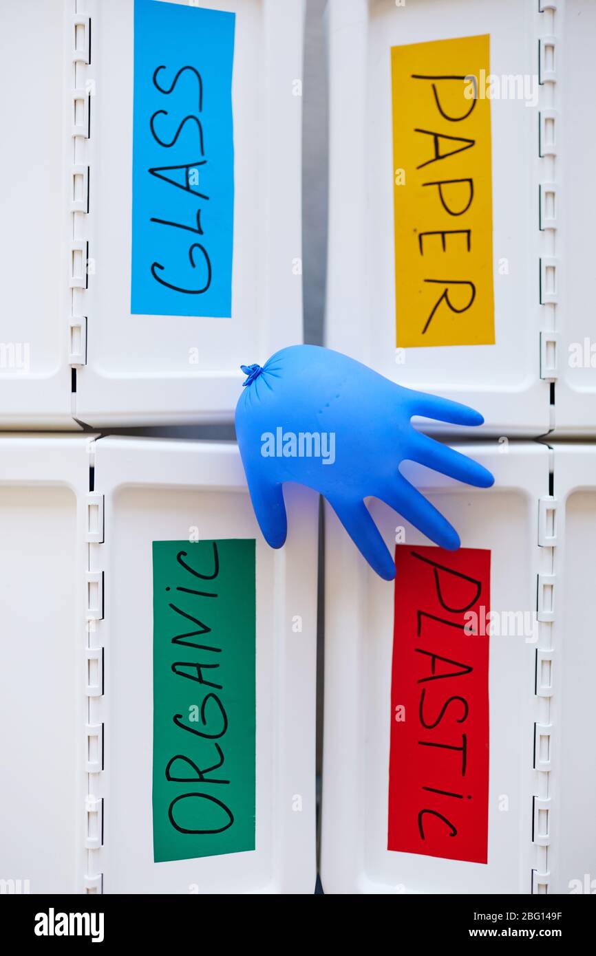 Above view background of four plastic bins labeled for storage and ...