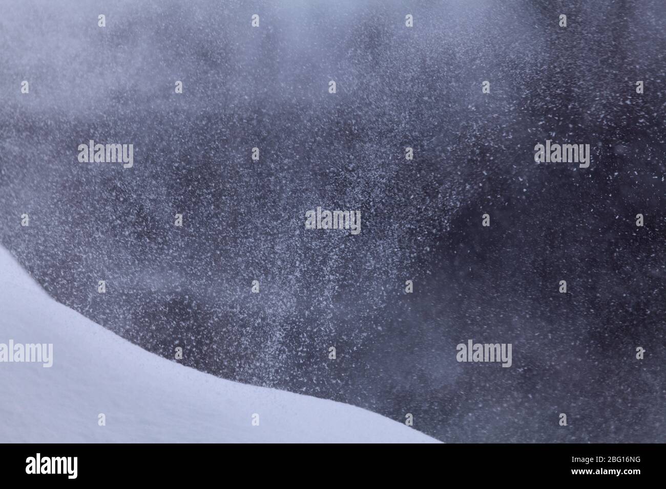 Close up look on snowdrift in a winter storm, dark background Stock ...