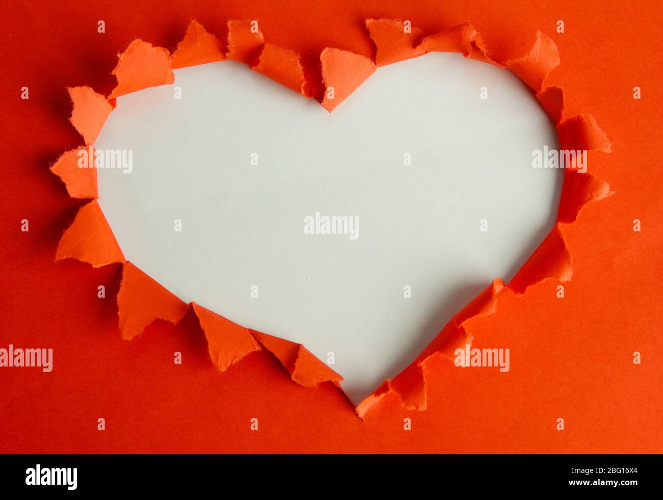 Beautiful torn paper in heart shape symbol Stock Photo - Alamy