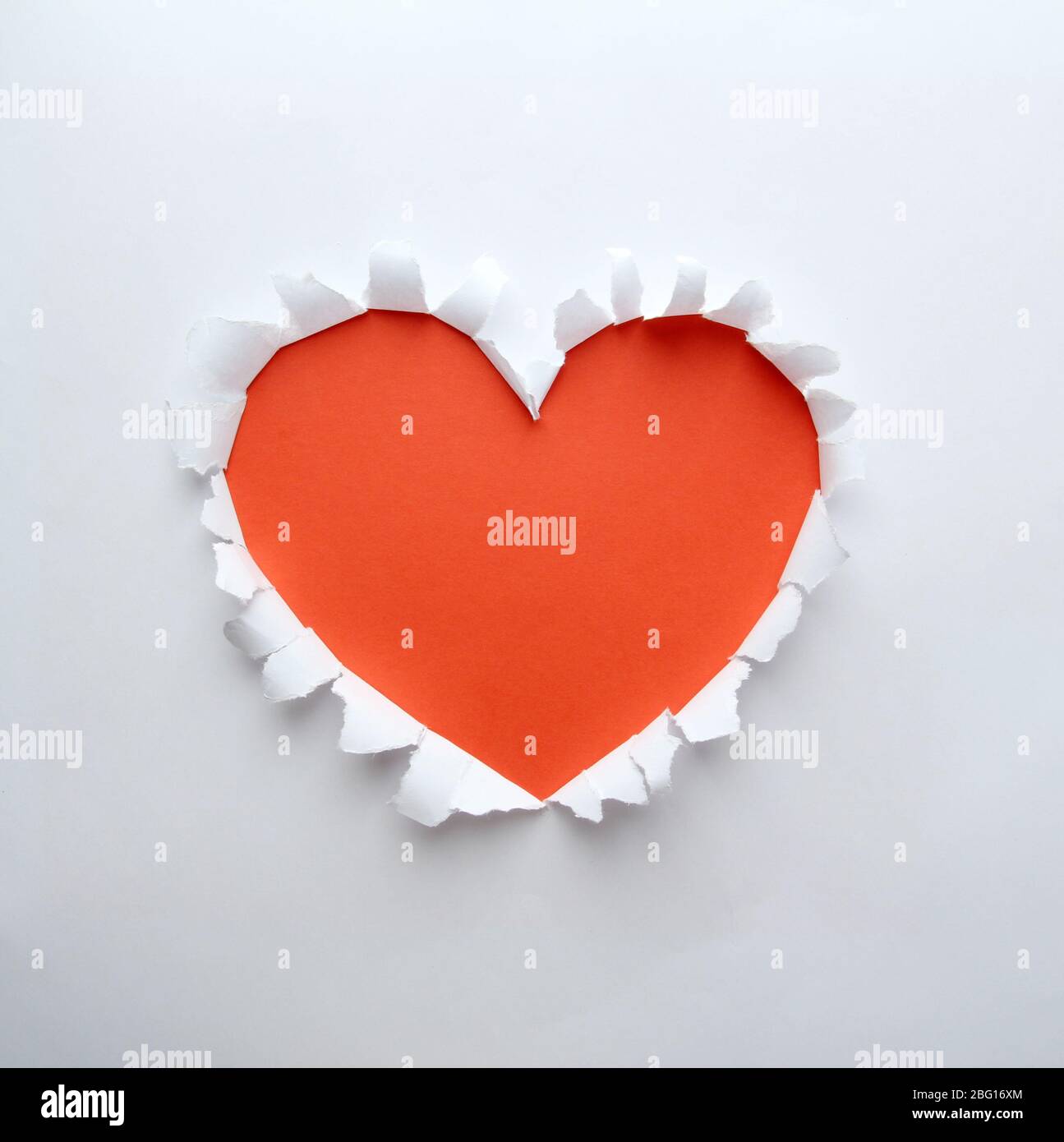 Beautiful torn paper in heart shape symbol Stock Photo - Alamy