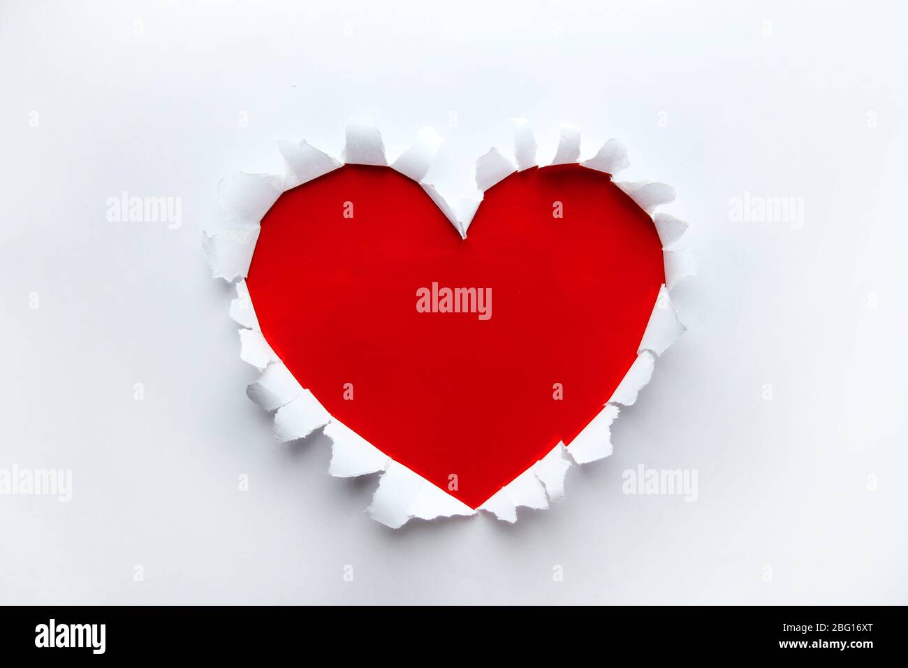 Beautiful torn paper in heart shape symbol Stock Photo - Alamy
