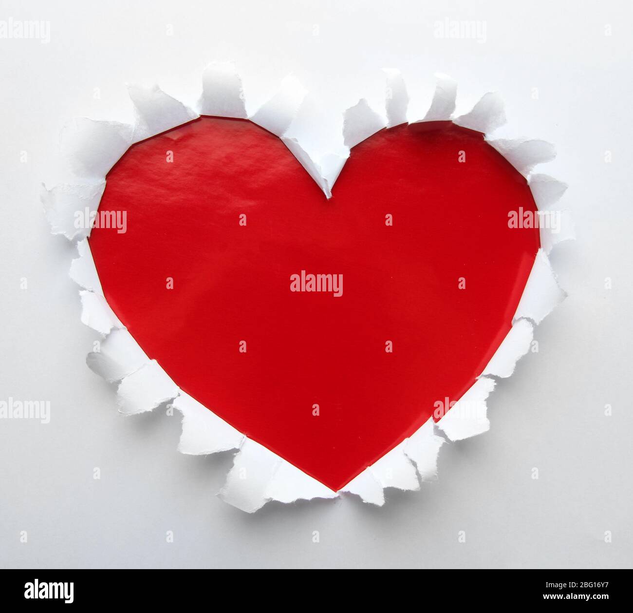 Beautiful torn paper in heart shape symbol Stock Photo - Alamy