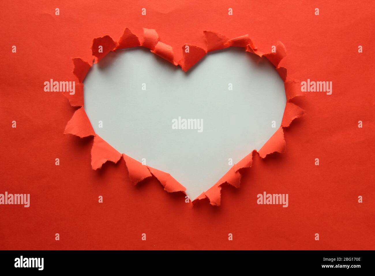 Beautiful torn paper in heart shape symbol Stock Photo - Alamy