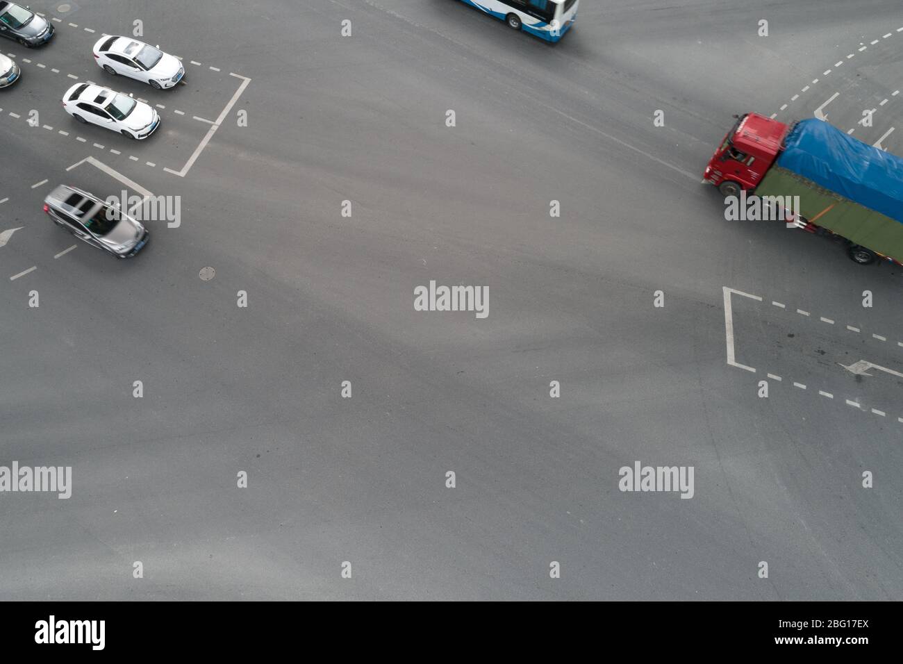 Aerial view on busy traffic intersection Stock Photo - Alamy