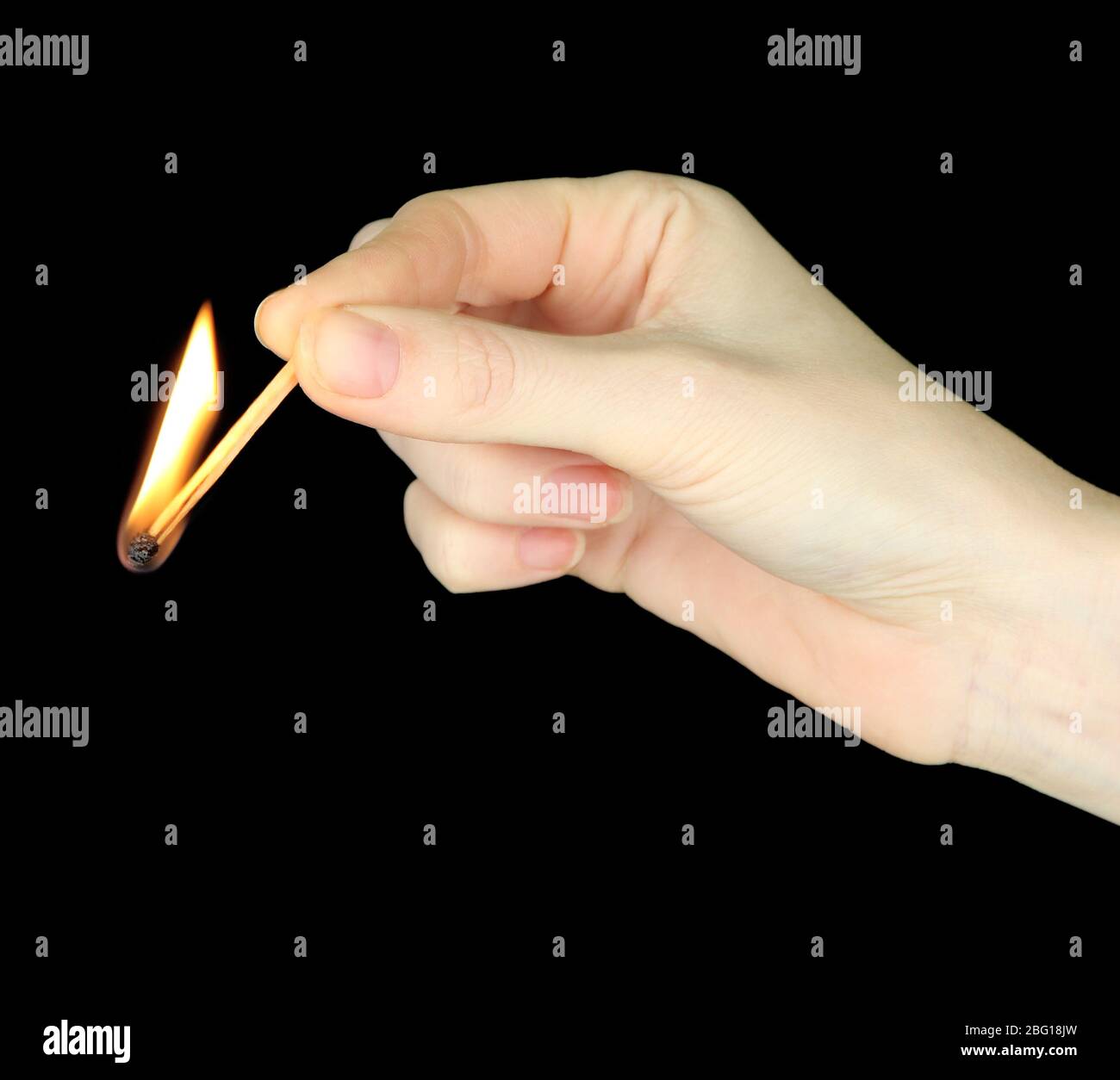 Burning lighter in female hand, isolated on black Stock Photo - Alamy