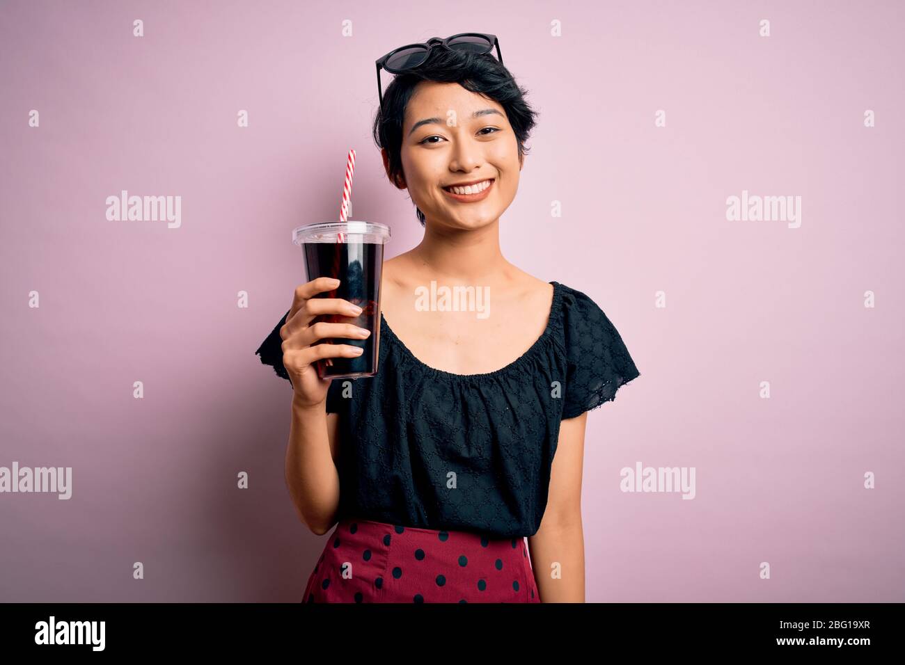 Drinking fizzy drink teeth hi-res stock photography and images - Alamy