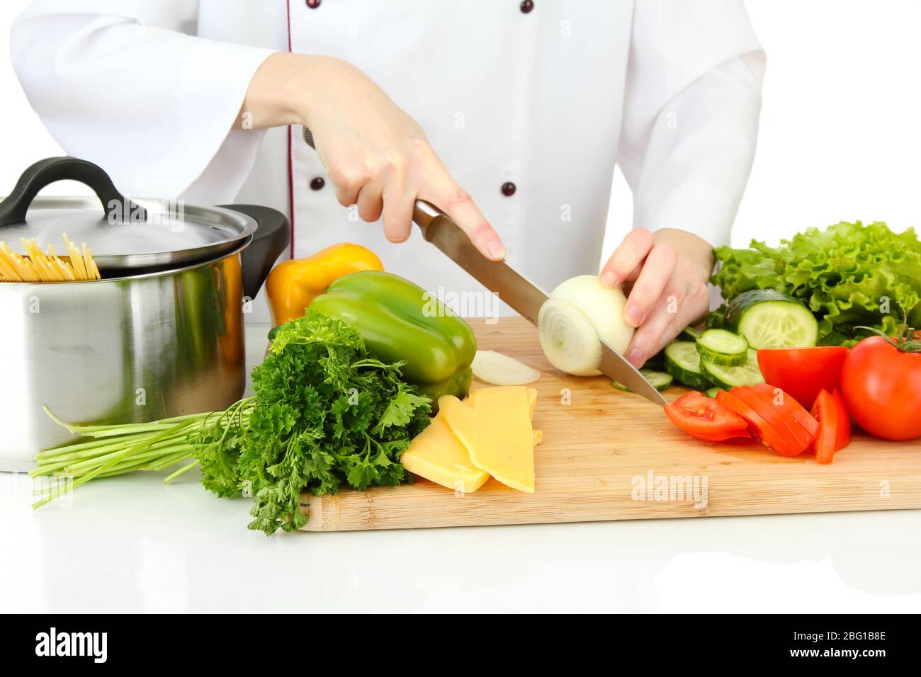 Female hands cutting vegetables, isolated on white Stock Photo - Alamy