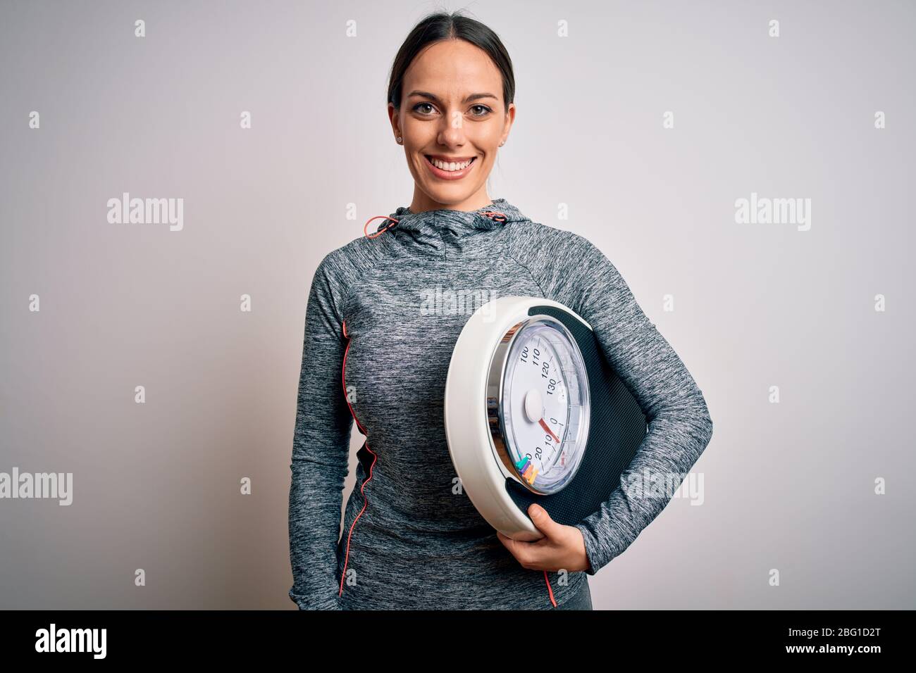 Person standing on scale clothes hi-res stock photography and images ...