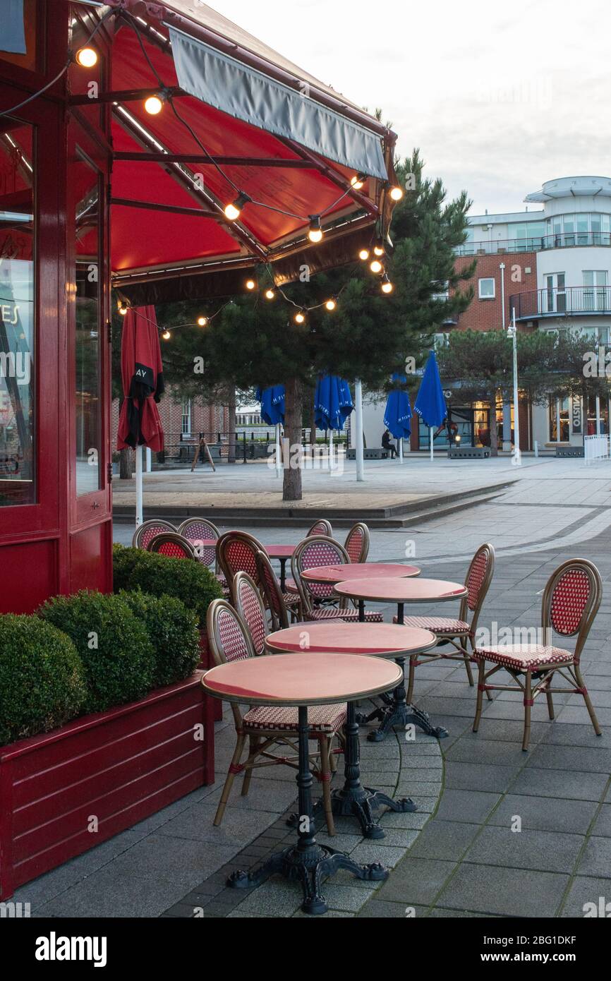Empty seats and tables outside a typical European restaurant Stock ...