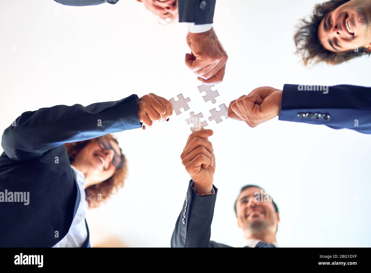 Circle people hands puzzle pieces hi-res stock photography and images ...