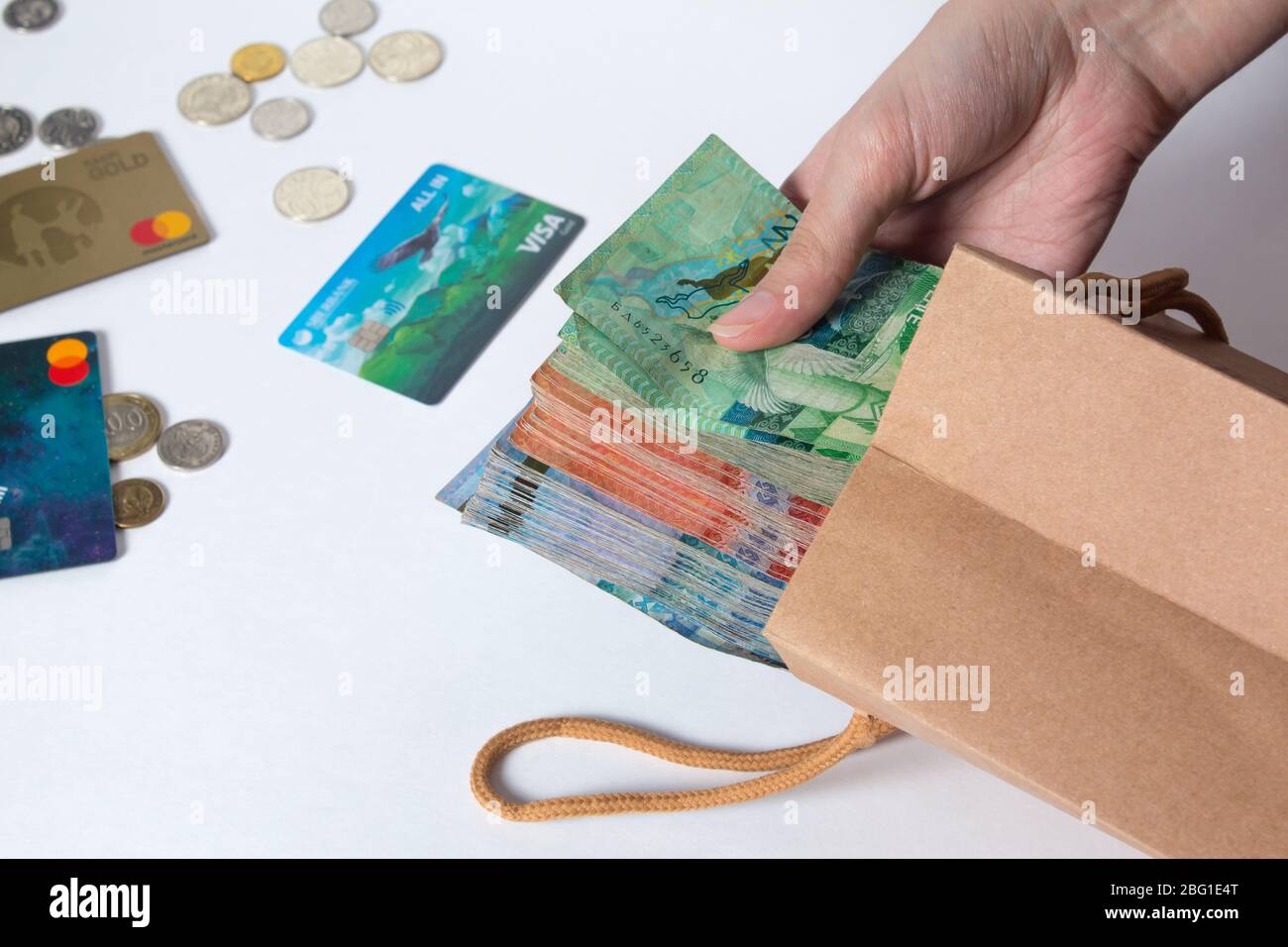 person pulls the money out of the bag. Tenge, Kazakhstan, banknote ...