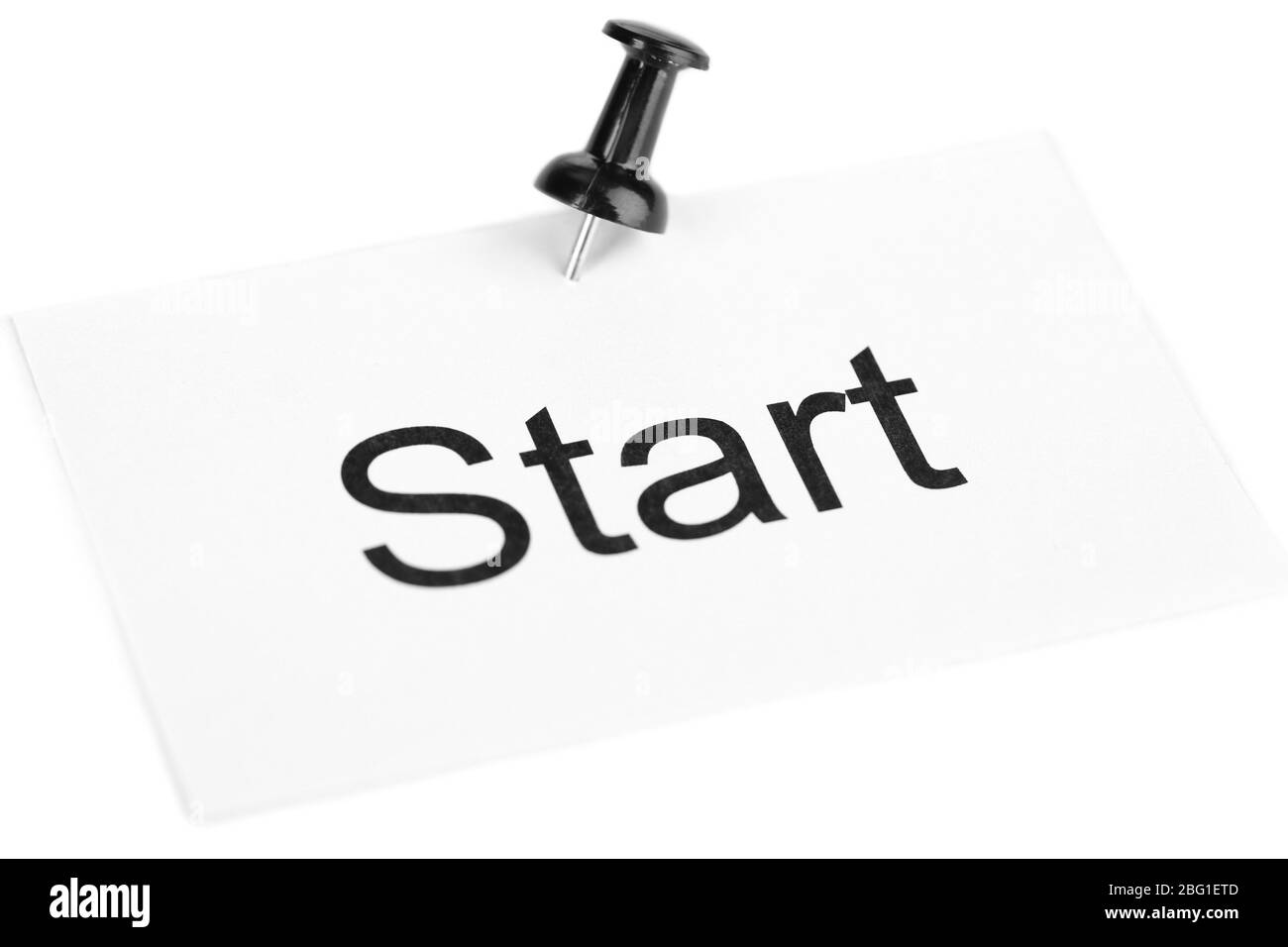 Push pin on paper with word start written on it isolated on white Stock ...