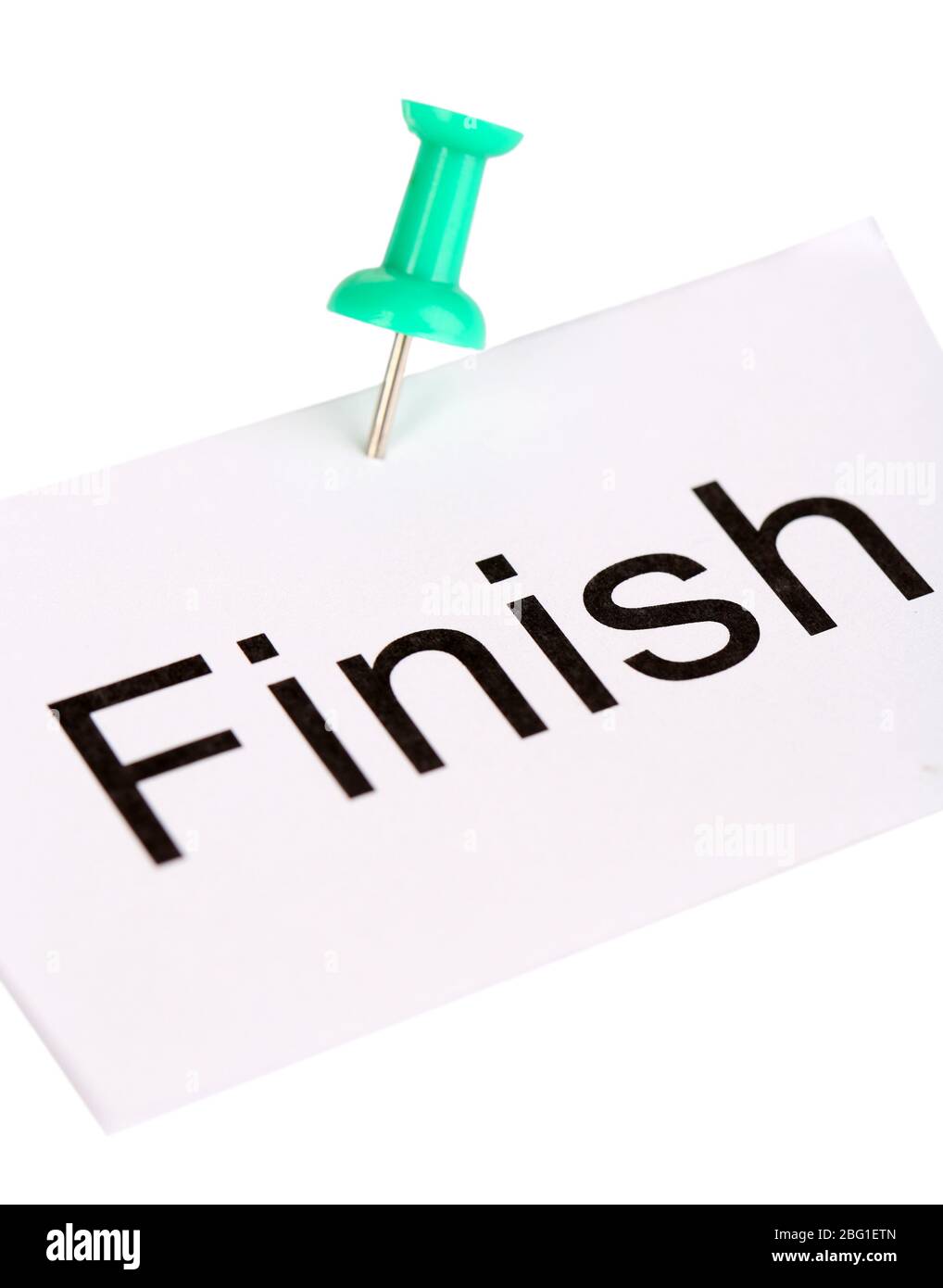 Push pin on paper with word finish written on it isolated on white ...