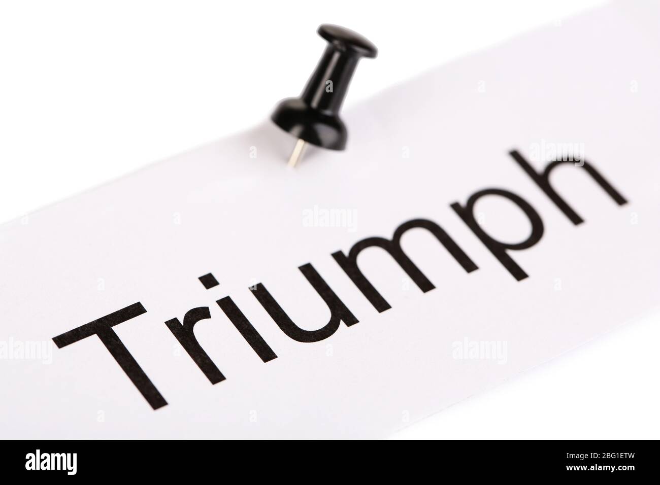 Push pin on paper with word triumph written on it isolated on white ...