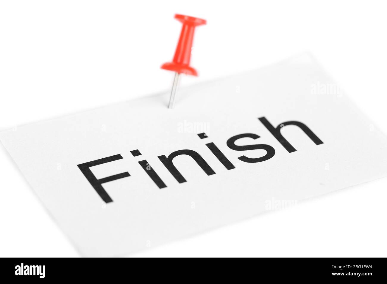 Push pin on paper with word finish written on it isolated on white ...