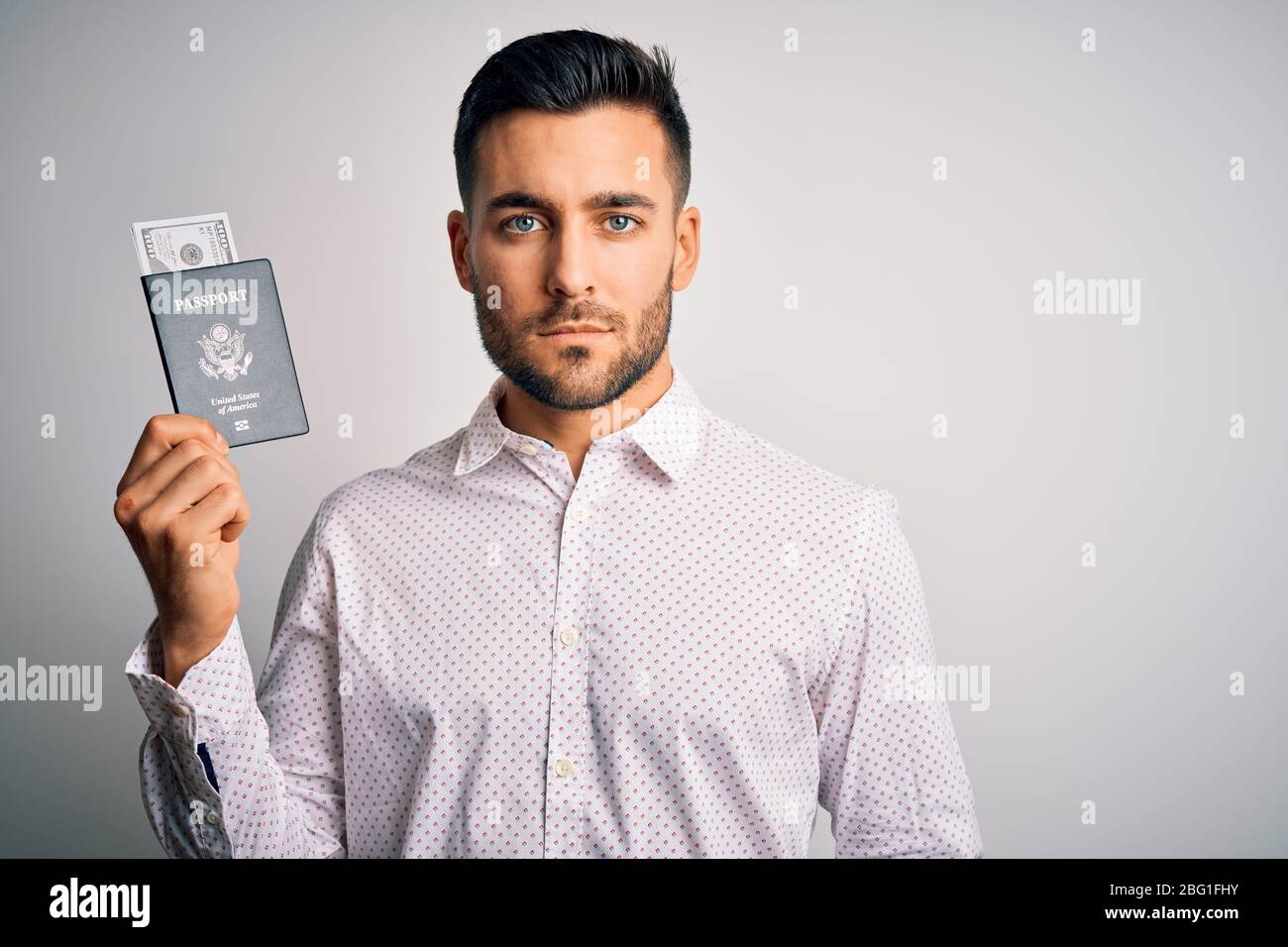 Young Handsome Tourist Man Holding United States Passport Id With Dollars With A Confident