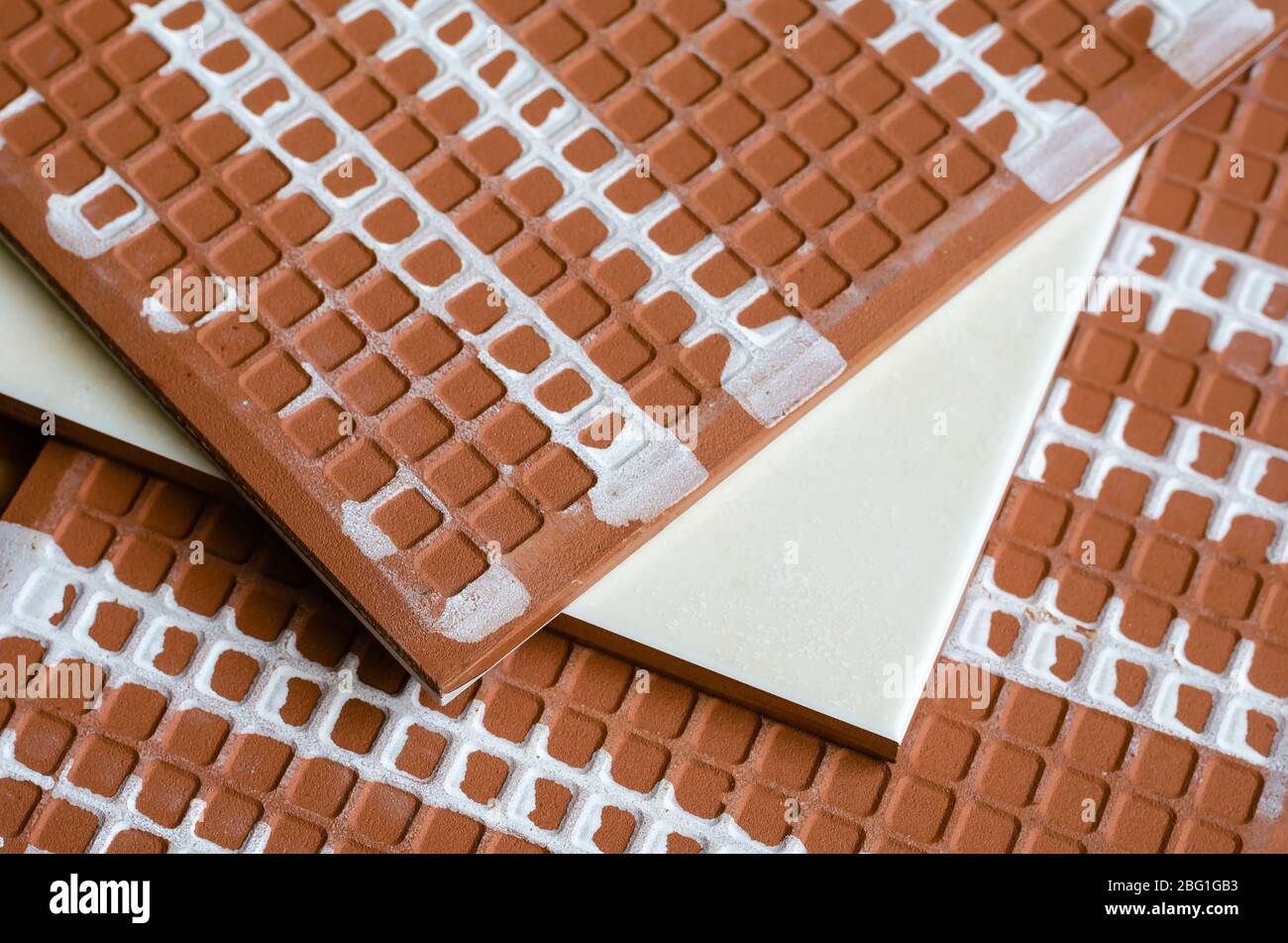 Ceramic tile close-up. A detailed shot of three ceramic tiles. Front ...