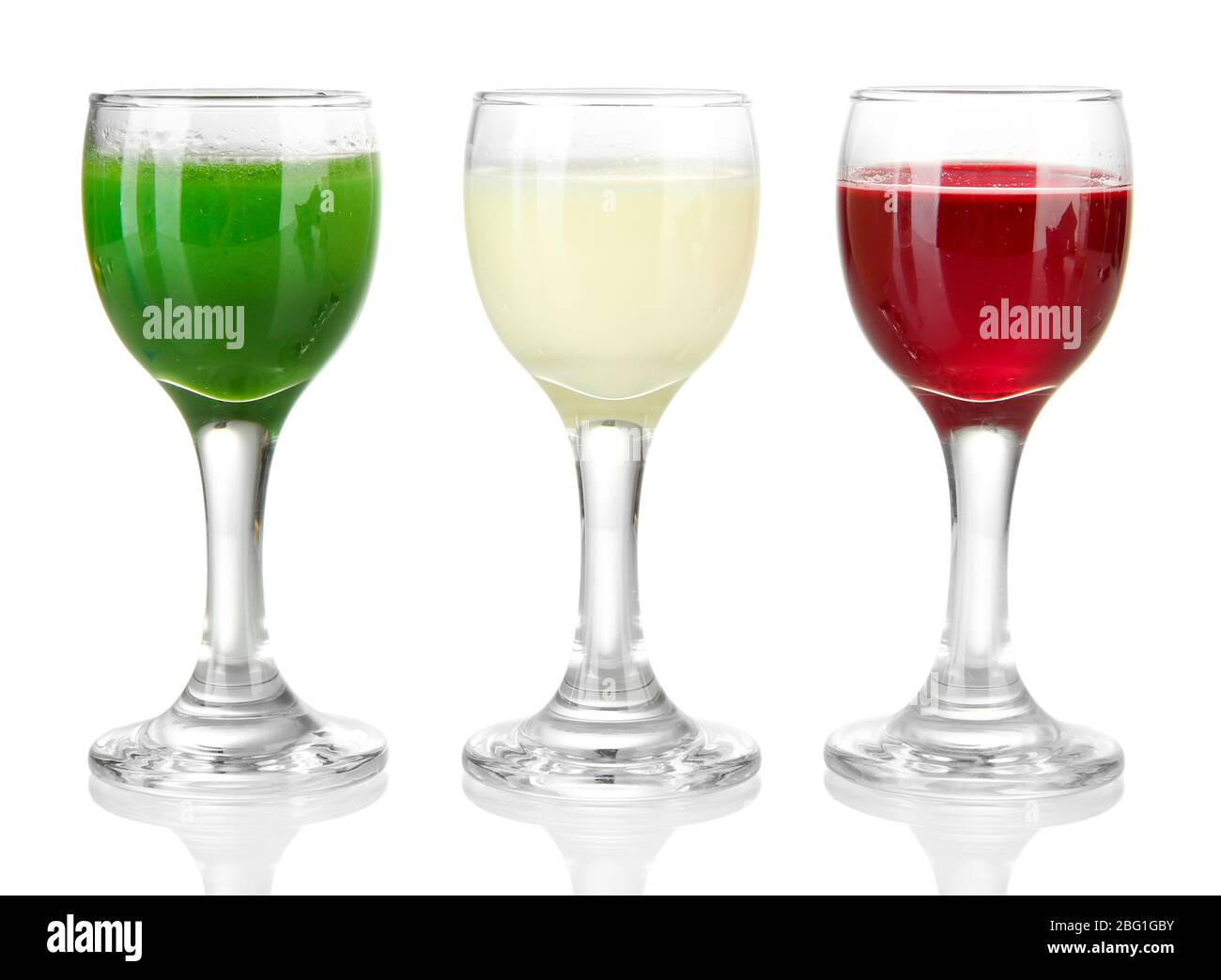 Tasty color liquors, isolated on white Stock Photo - Alamy