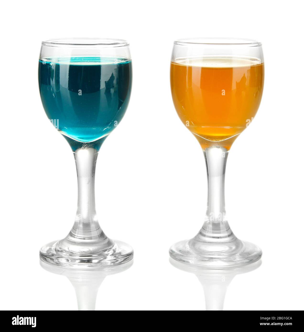 Tasty color liquors, isolated on white Stock Photo - Alamy