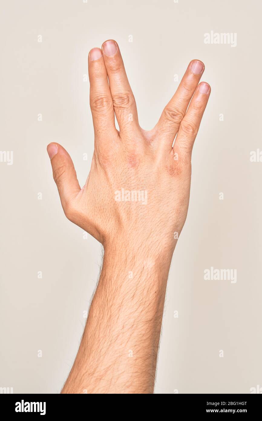 Hand of caucasian young man showing fingers over isolated white ...
