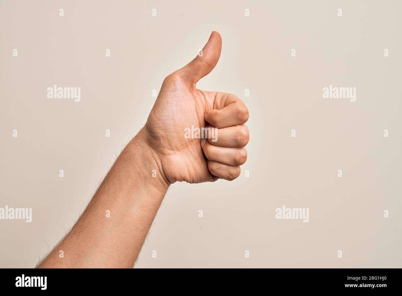 Hand of caucasian young man showing fingers over isolated white ...