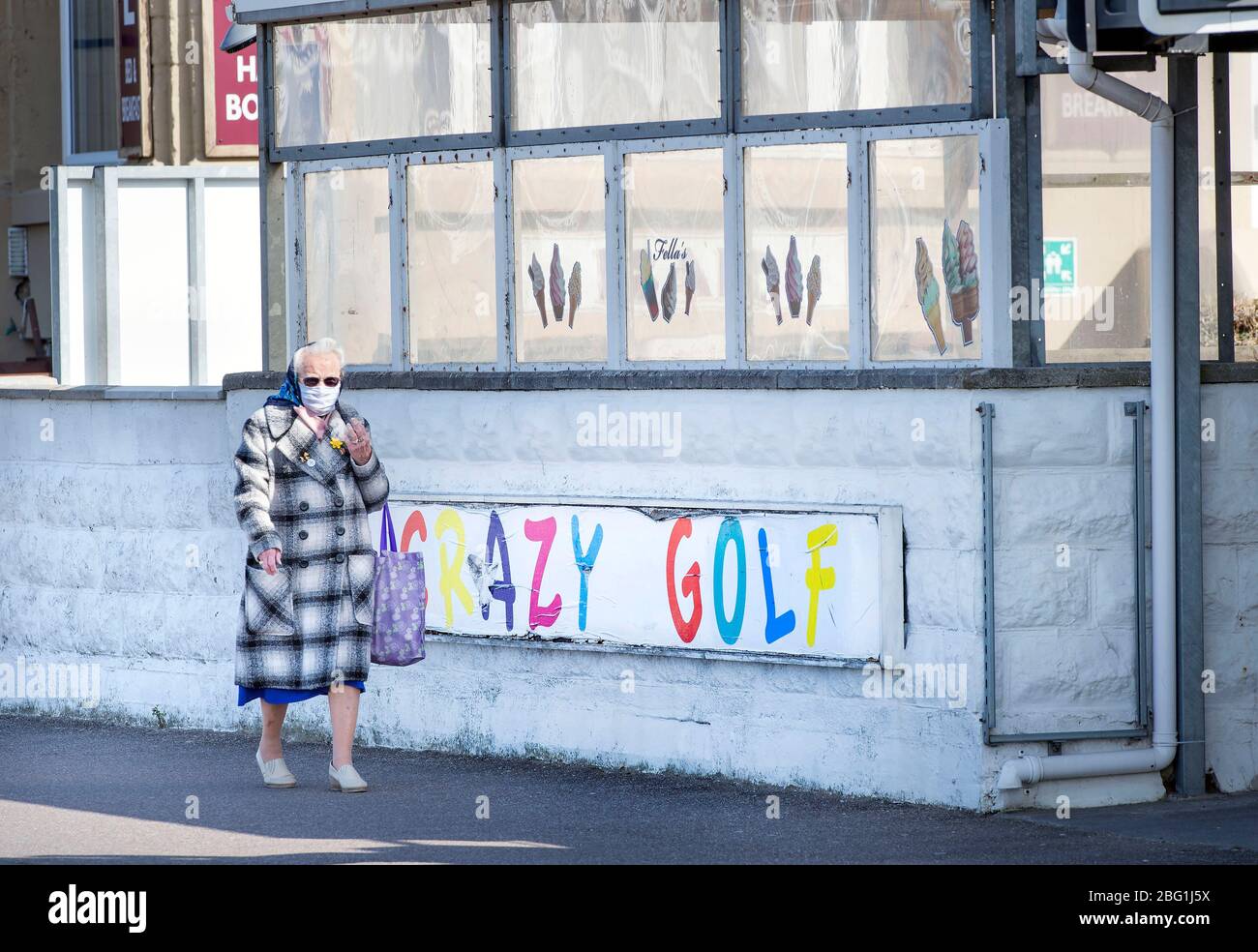 A retired lady goes out for her shopping in Weston-super-Mare during ...